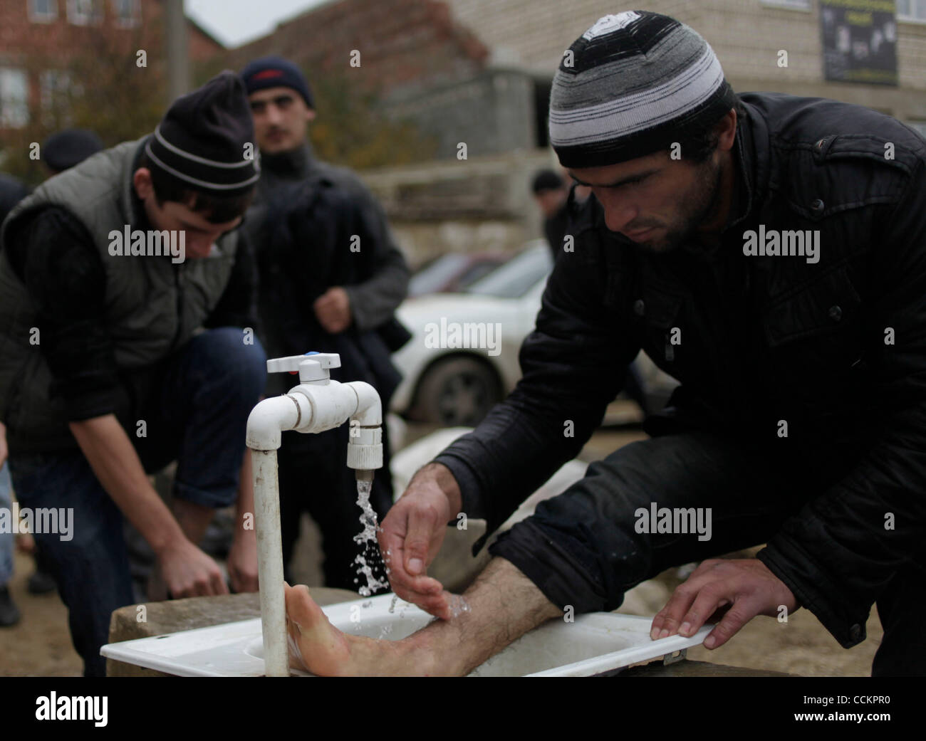 Nov 19, 2010 - Makhachkala, Dagestan, Russia - Muslim men wash their ...