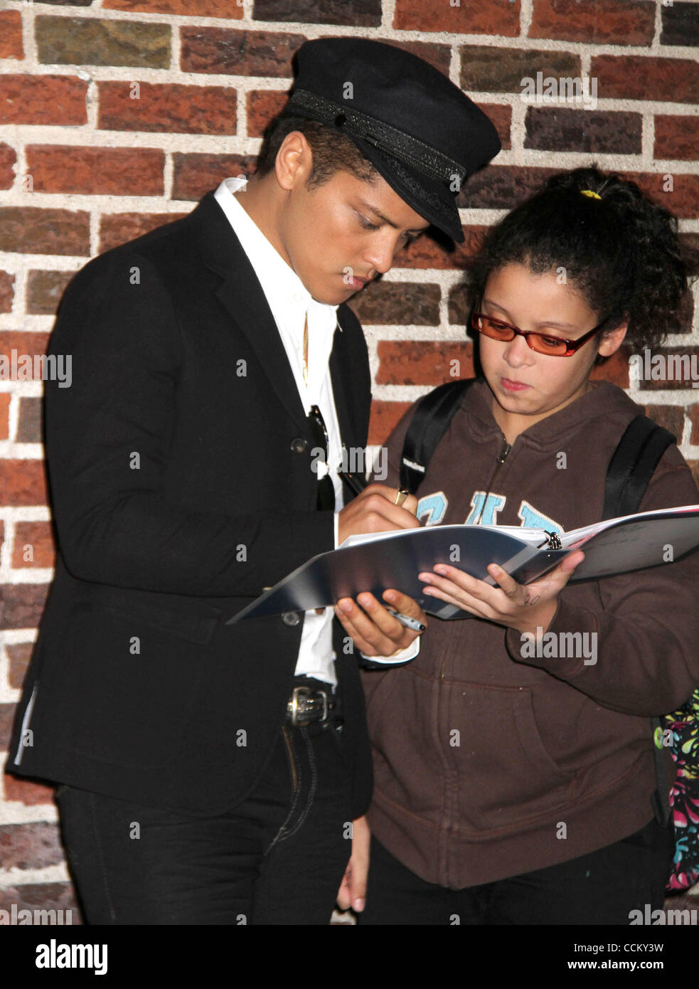 Nov. 11, 2010 - New York, New York, U.S. - Singer BRUNO MARS signs an ...
