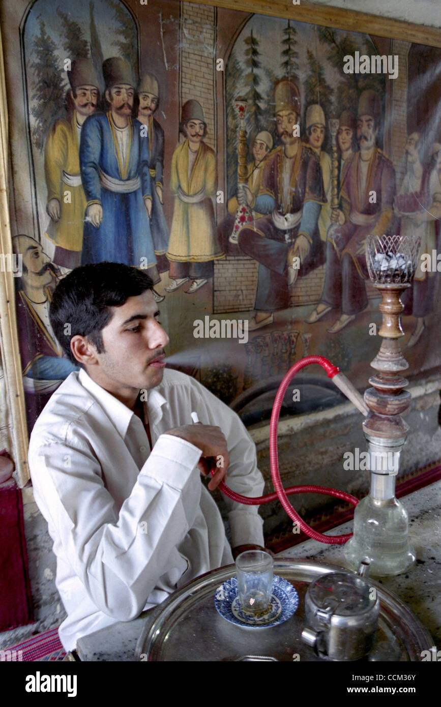Iran , Esfahan , a man with hookah in a cafe shop Stock Photo - Alamy