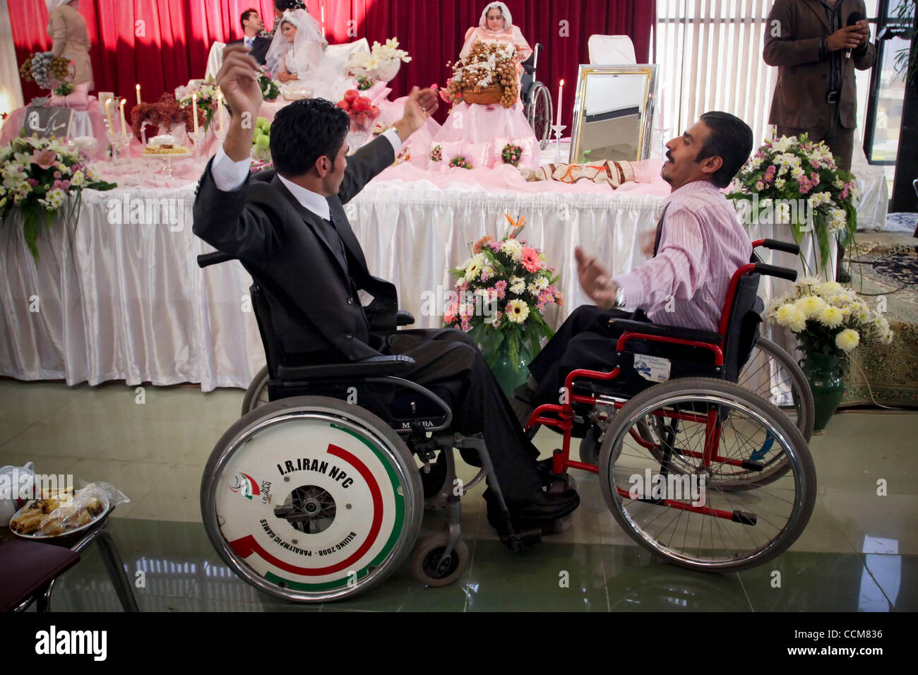 Two residents of Kahrizak Charity Foundation dance during a wedding ...