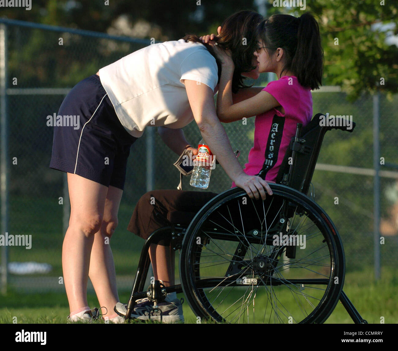 SA LIFE: Laura Dominguez (rt.) whispers in her mother Rosie Dominguez's ...