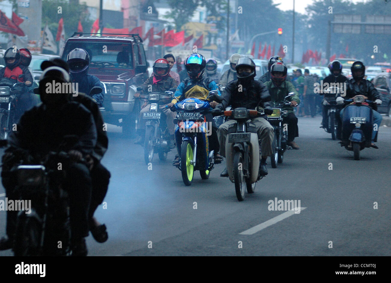 JAKARTA, INDONESIA - JUNE 15, 2004 Atmosphere queue of motorcycle ...