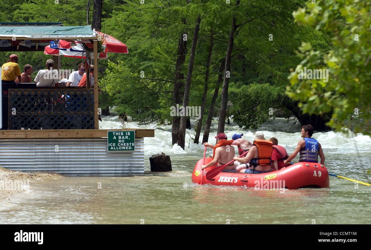 METRO --- Rafters make their way Thursday afternoon June 17, 2004 to ...
