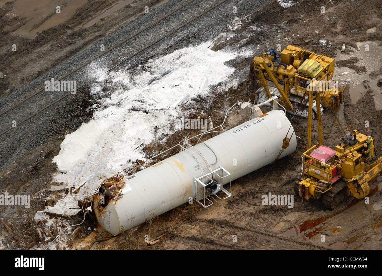 METRO --- A tank car remained on its side, as seen in this aerial photo ...