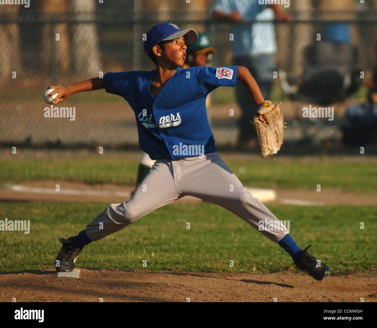 Pittsburg Dodgers pitcher Barney Moreno Jr. (cq) delivers a pitch vs ...
