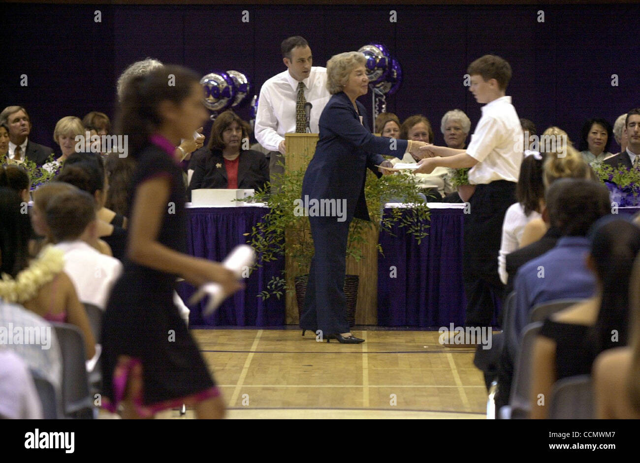 Principal Carol King presents certificates to the Piedmont Middle ...