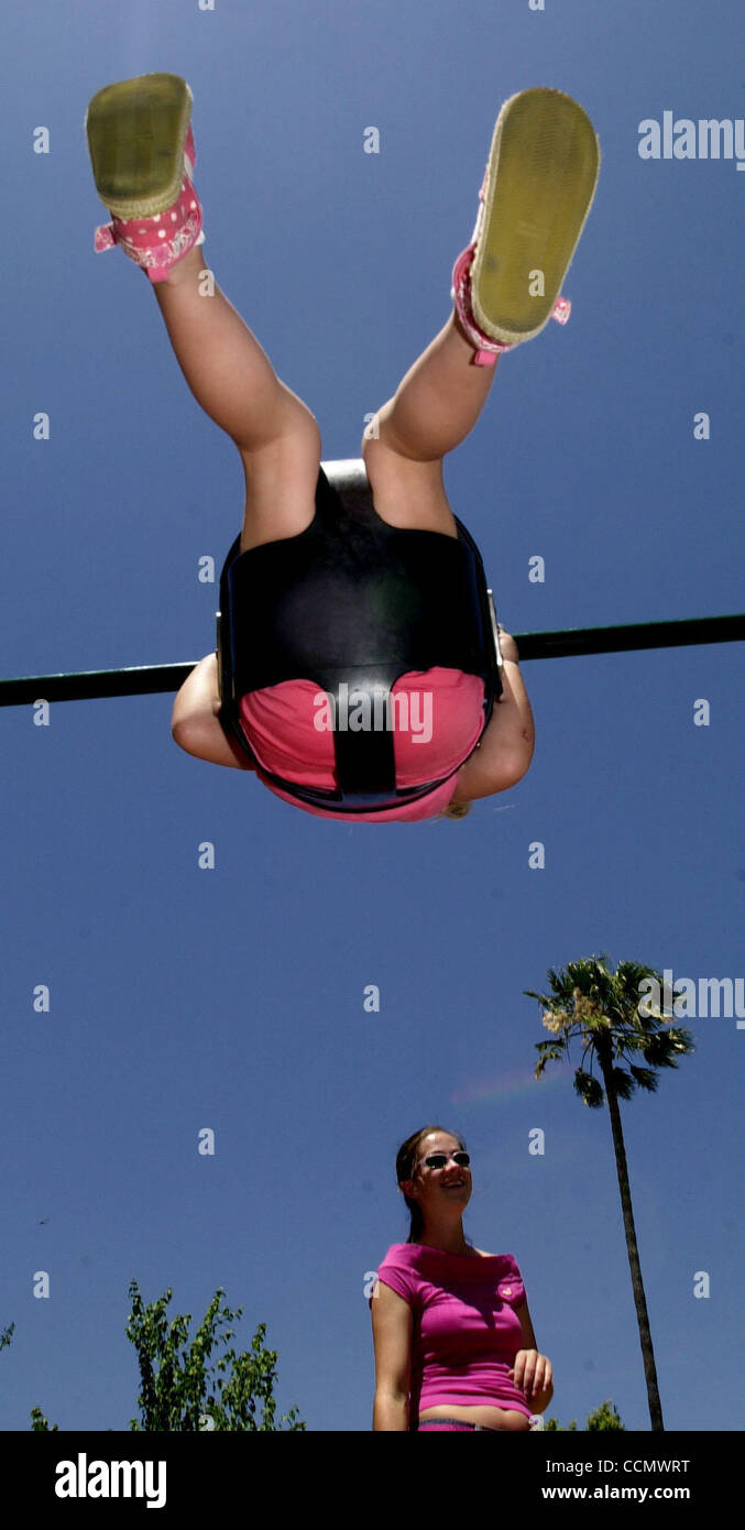 13:51--- Baby sitter Michelle Swanson supplies the push for Mackenzie ...