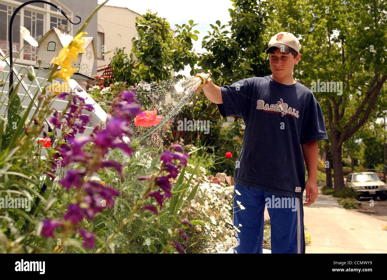 Sam Bernstein, 13, got a job watering plants for the summer or as ...