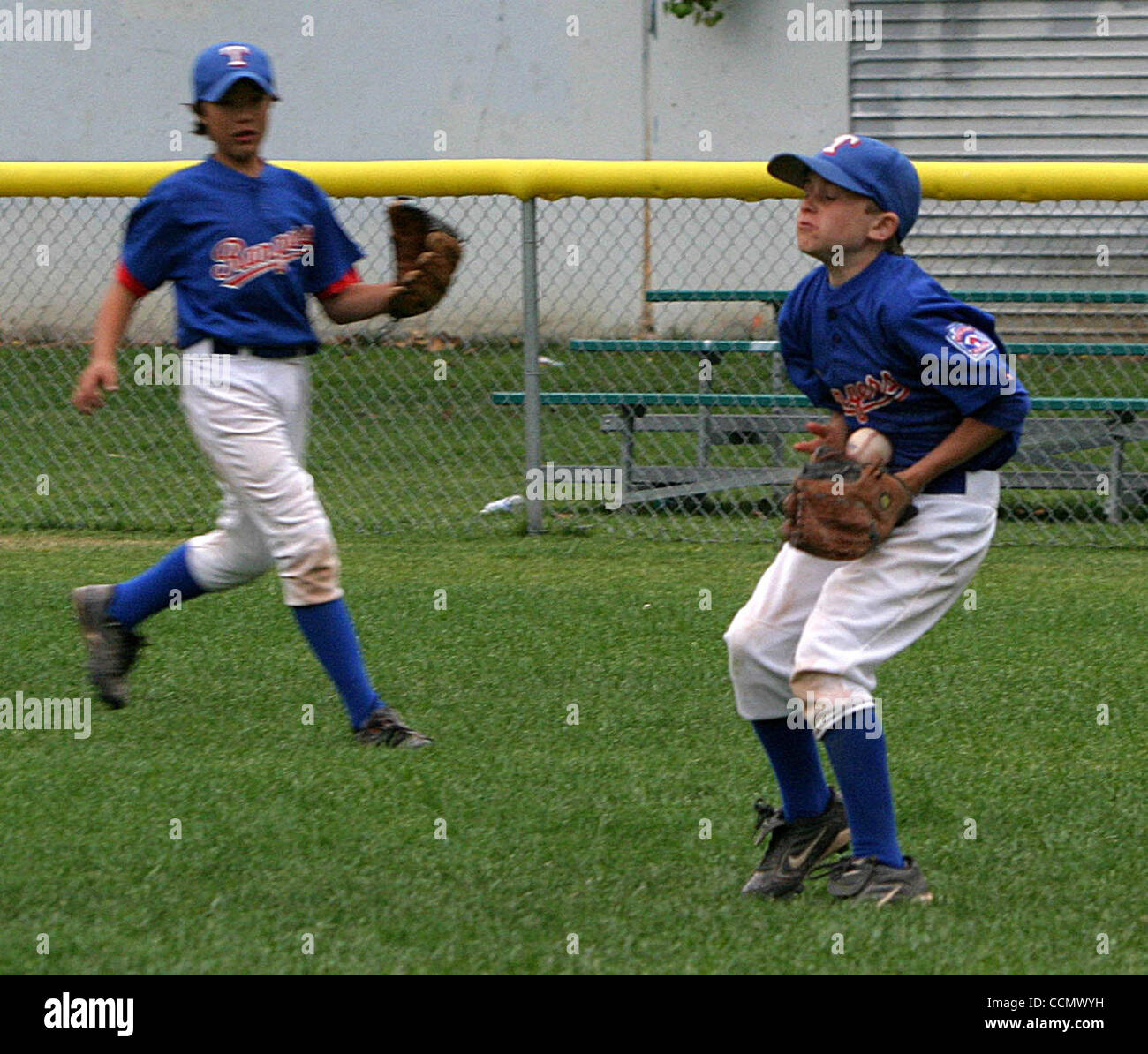 (Right) South Oakland Rangers Alex Bonacum catches a fly from an ...