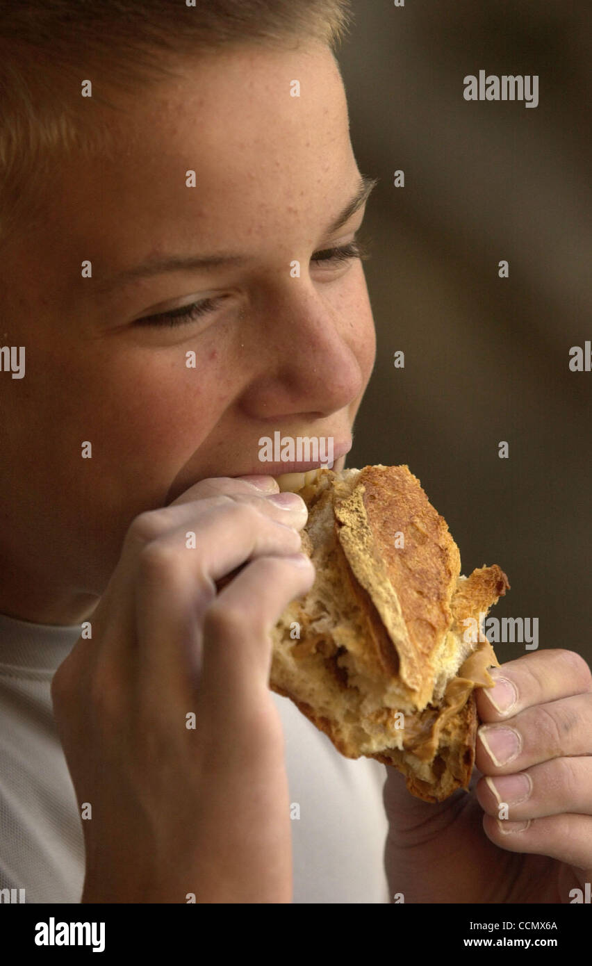 Scott Cory, 14, of Brentwood, takes a break from practicing his ...