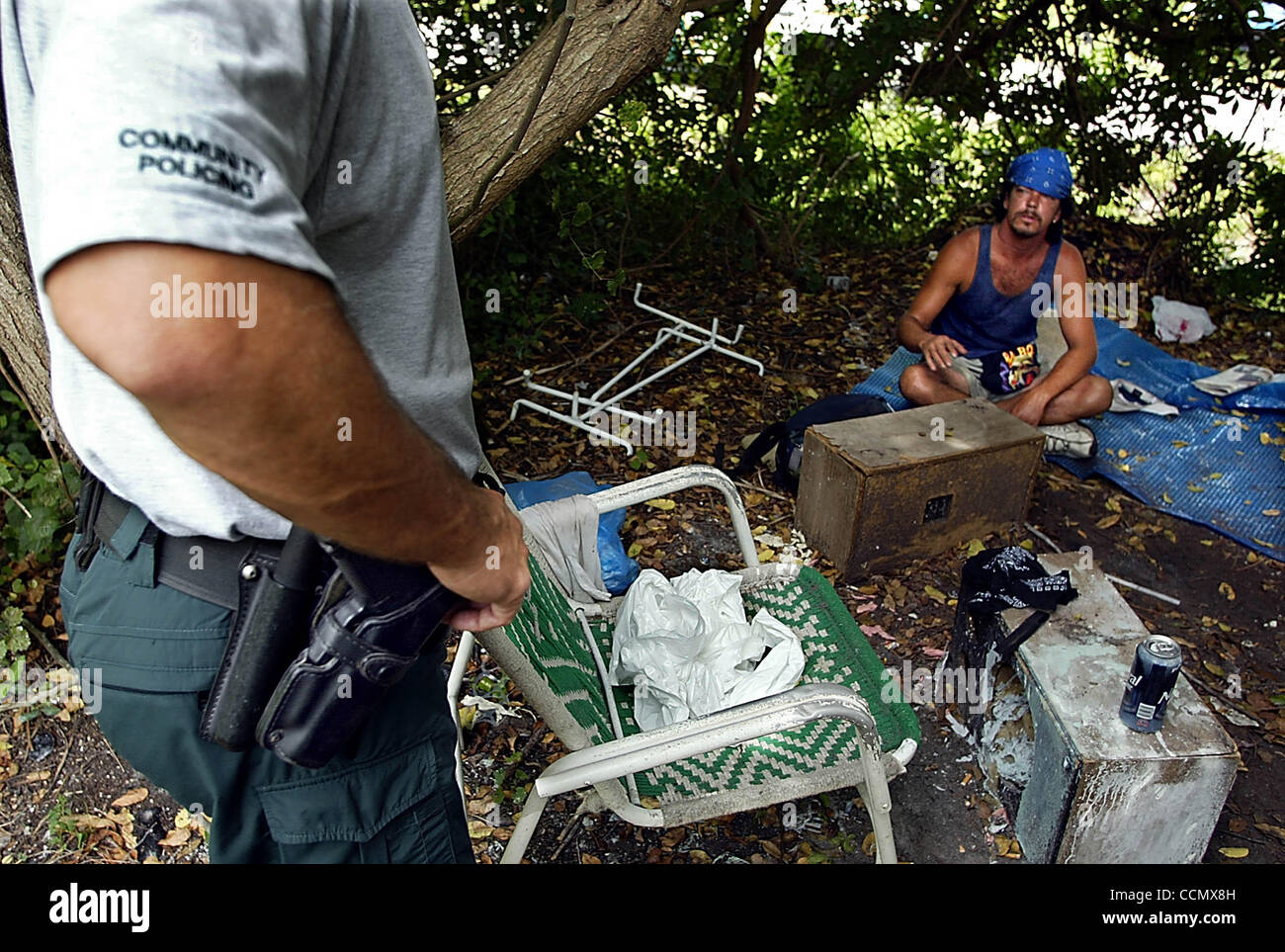 ADVANCE METRO, PORT SALERNO, 7/1/04.....Martin County deputy Dennis ...
