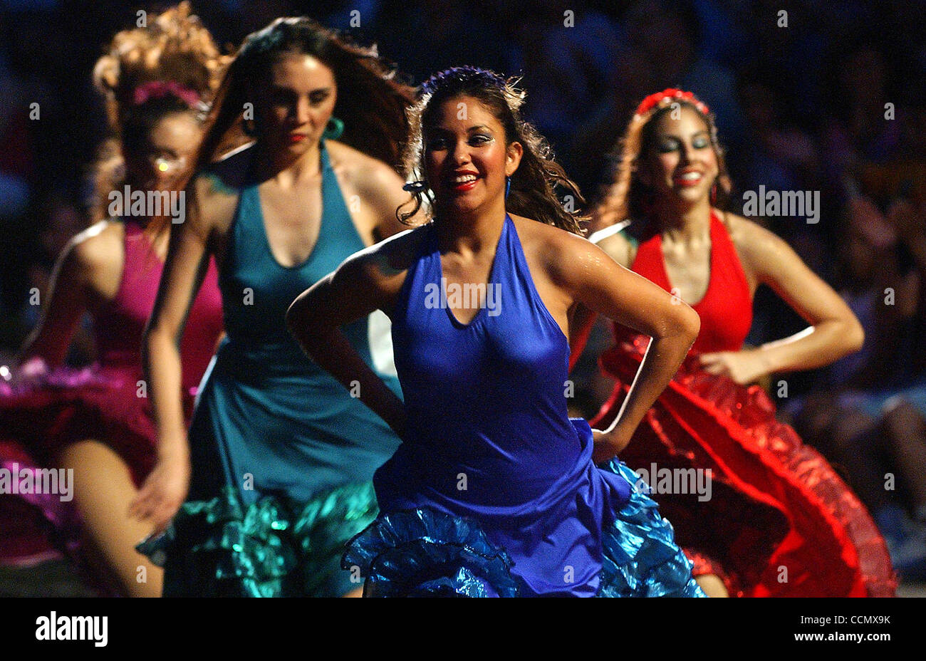 METRO Dancer for Fiesta Noche del Rio whirl and run for backstage after ...