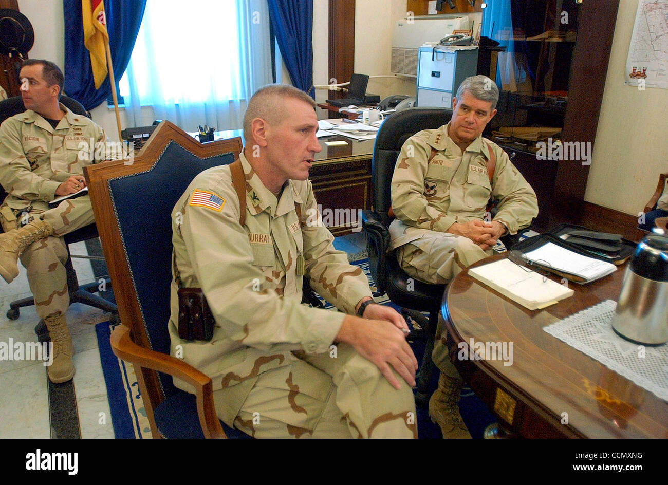 Jul 07, 2004; Baghdad, IRAQ; U.S. Army Col. MIKE MURRAY (L) talks with ...