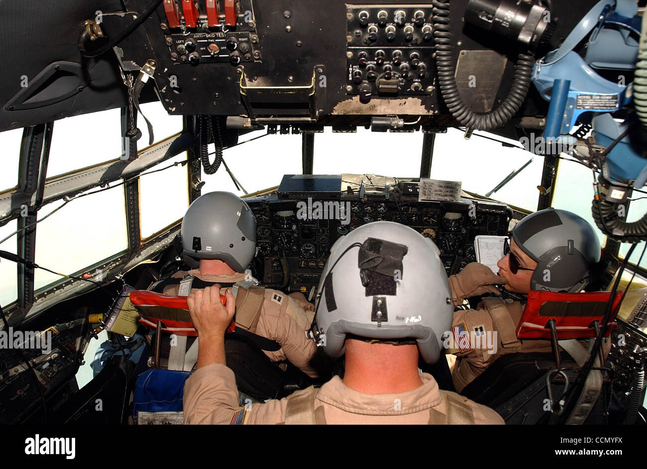 FOR METRO - U.S. Air Force Pilot Capt. Mike Lowe (left) pilots a C-130 ...