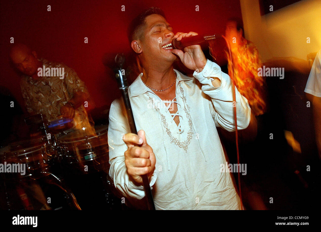 ETHNIC BARS 0720: Ivan Pacheco, singer with the band Tropicante, belts ...