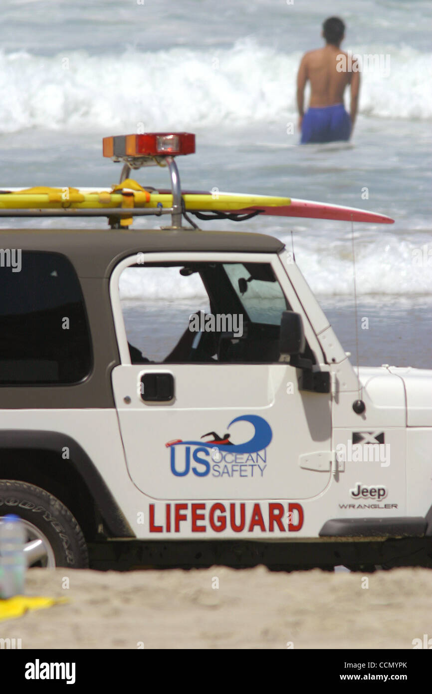 Jul 17, 2004; Salt Creek, CA, USA; Lifeguard driving a jeep on the ...