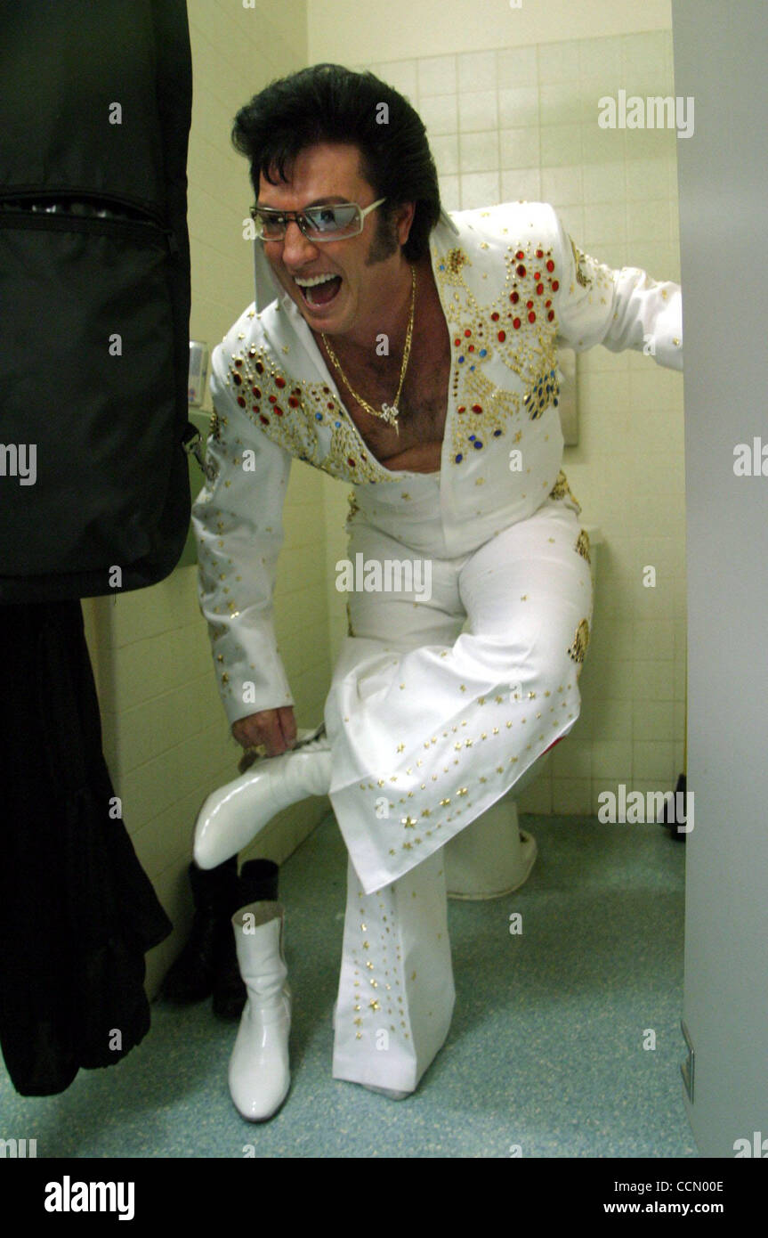 Elvis tribute artist James Clark (cq), of Pleasanton, laughs at a joke ...
