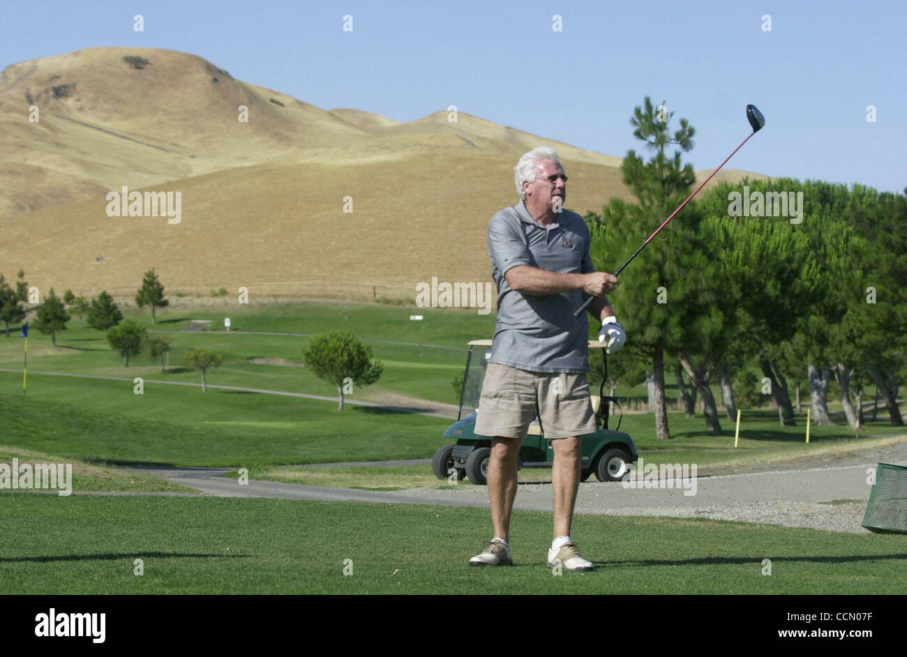 Dave Pearson of Pittsburg California drives a ball from the 9th tee at ...