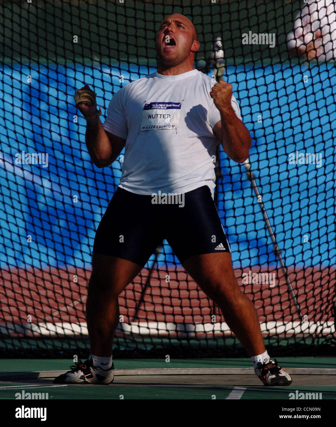 Travis Nutter reacts after throwing 237.05 feet in the Men's Hammer ...