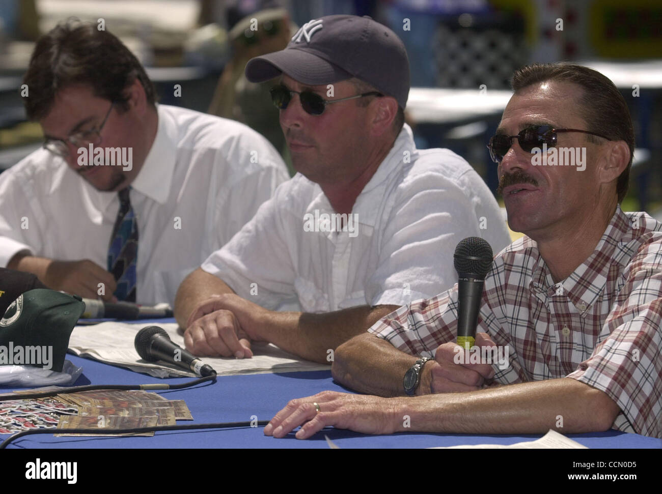 Race Track Announcer John McGary, left, Jockey Agent Dennis Patterson ...