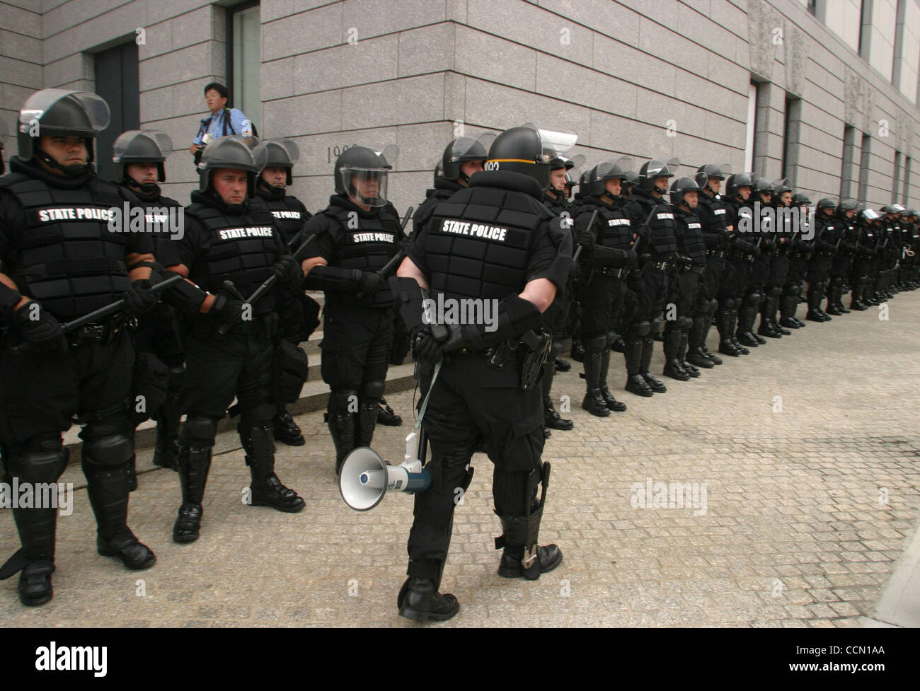 Jul 25, 2004; Boston, MA, USA; State Police in riot gear are out in ...