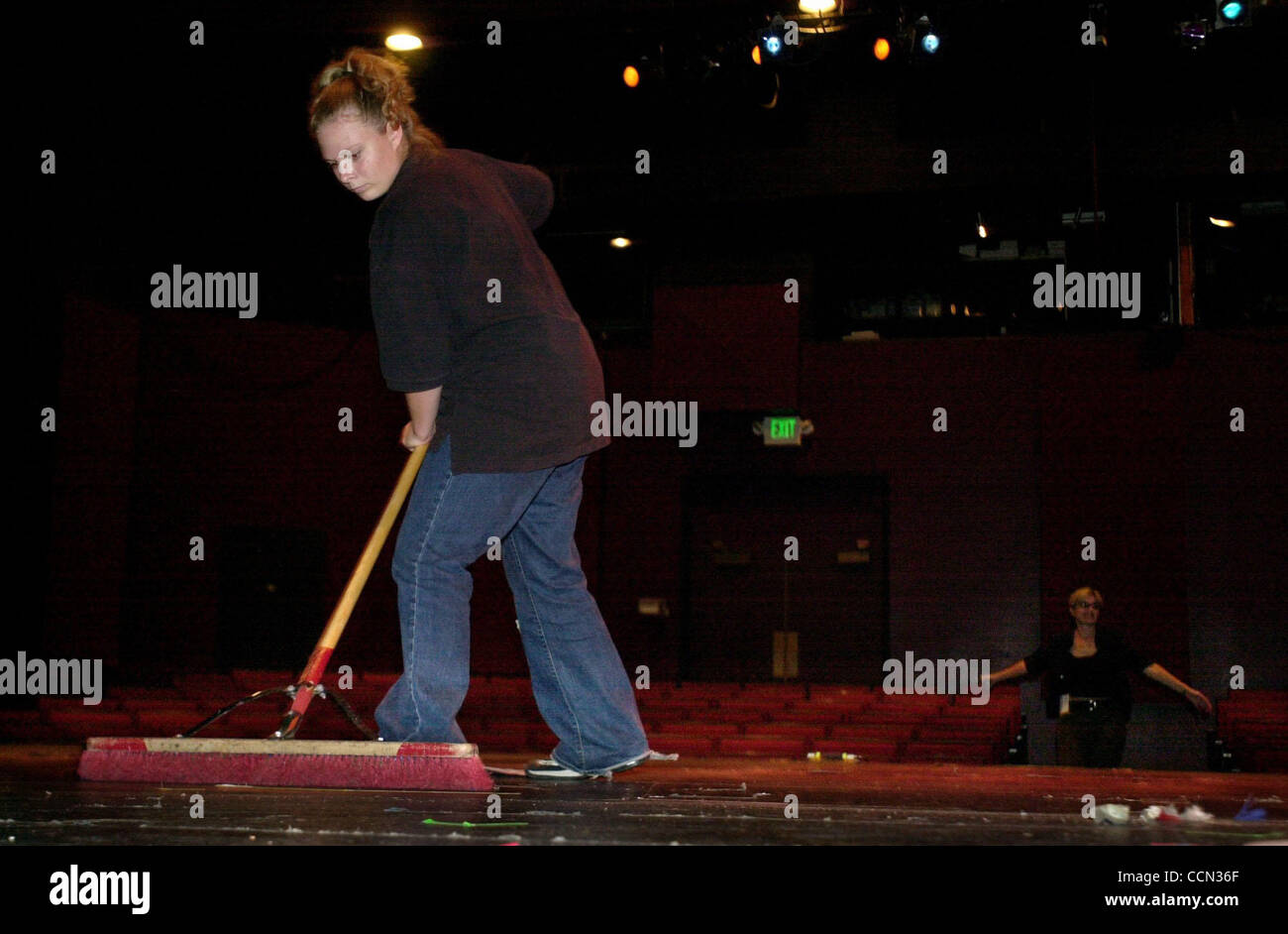 6:56pm...Spotlight operator Cassandra Hodges(cq) sweeps the stage clean ...