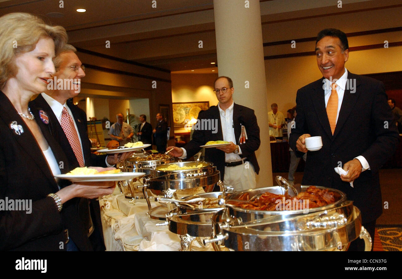 METRO-Henry Cisneros laughs with Congressman Jim Turner at the Texas ...