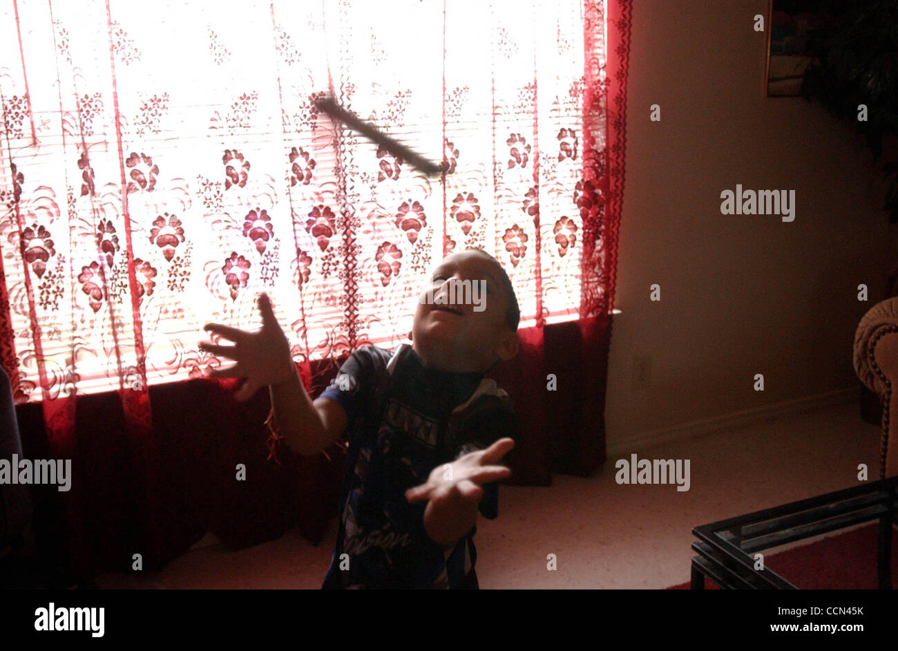 METRO-A fruit roll-up becomes a toy for Andrew Chapa, 5, a boy ...