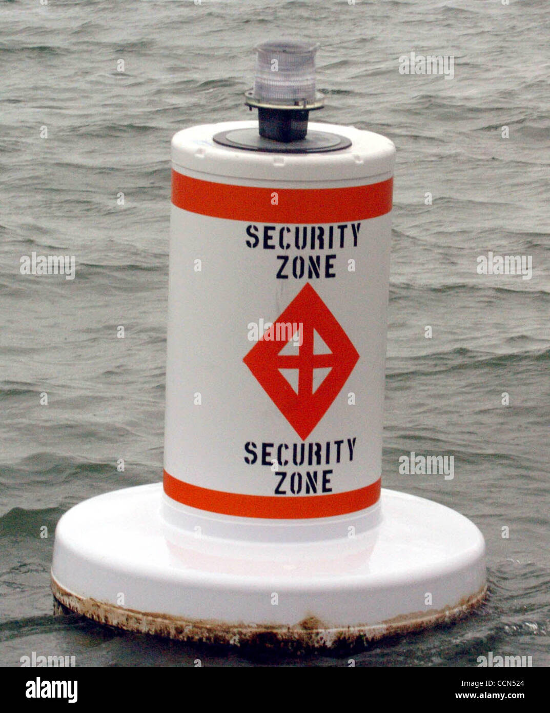 The SFO and OAK security zones are marked with small white buoys that ...