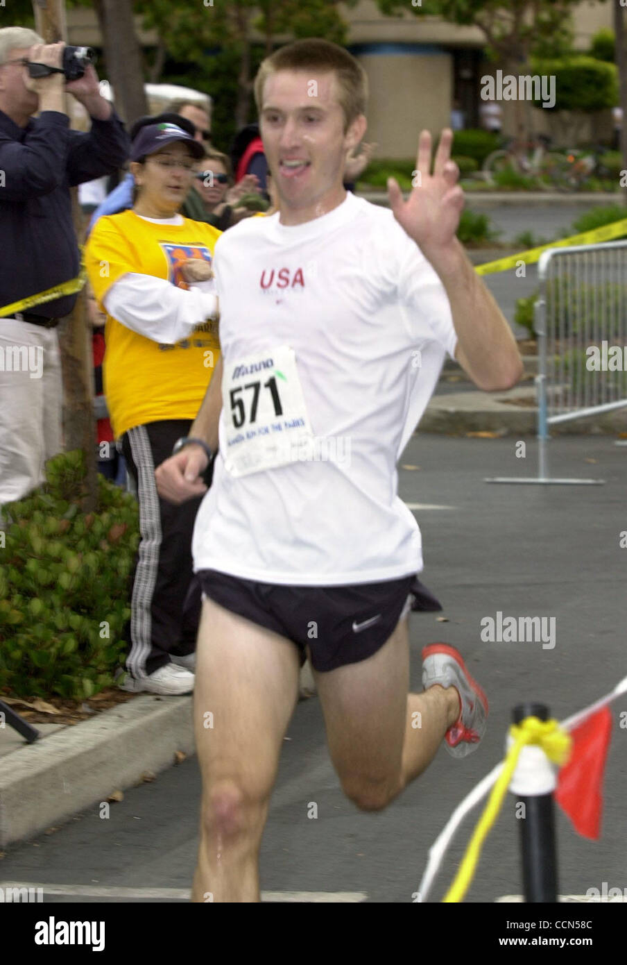 Chris Layman of Chico is the first man to cross the finish line in the ...