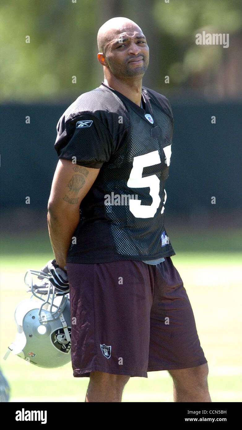 Dwayne Rudd stands on the sidelines during the Oakland Raiders ...