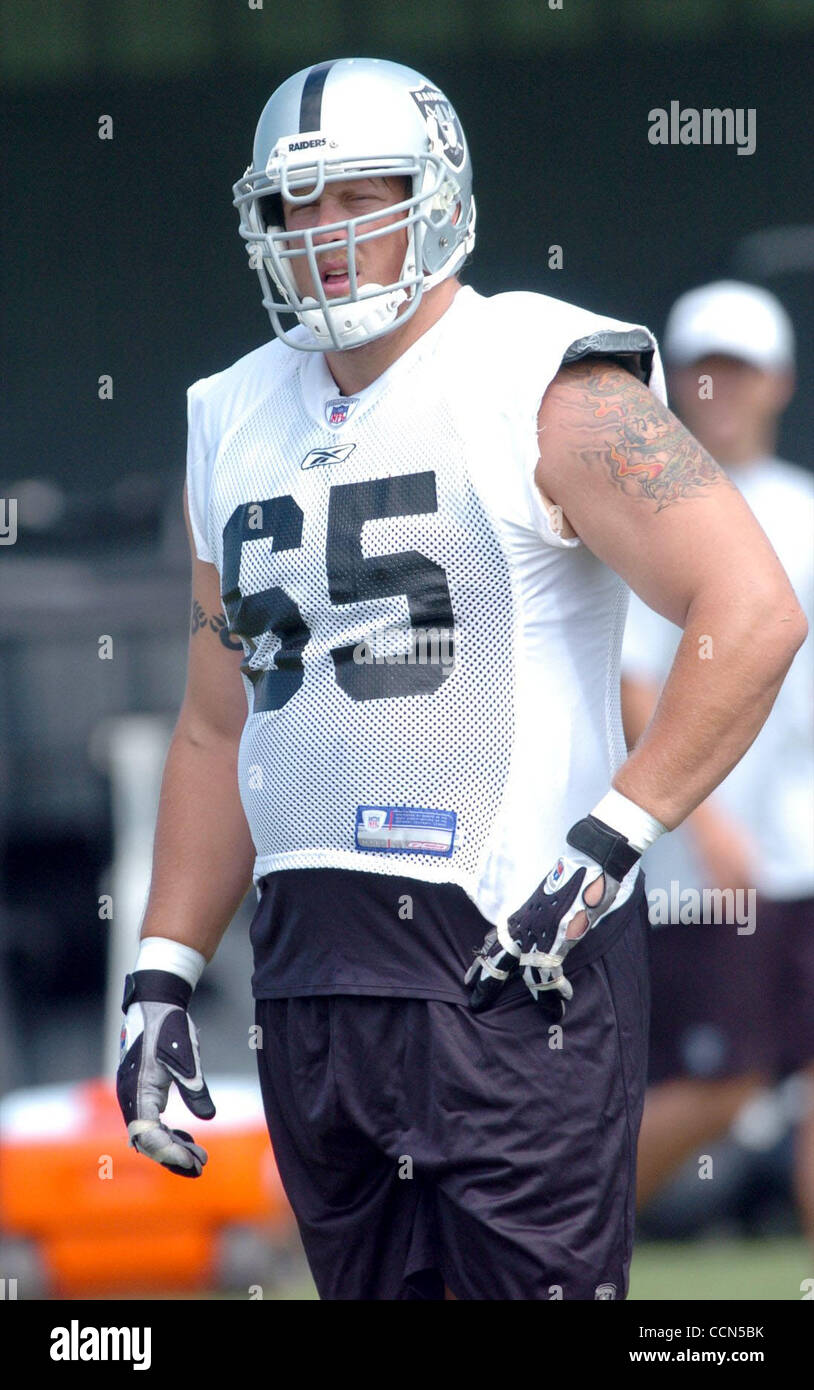 Barry Sims watch practice during the Oakland Raiders' training camp on ...