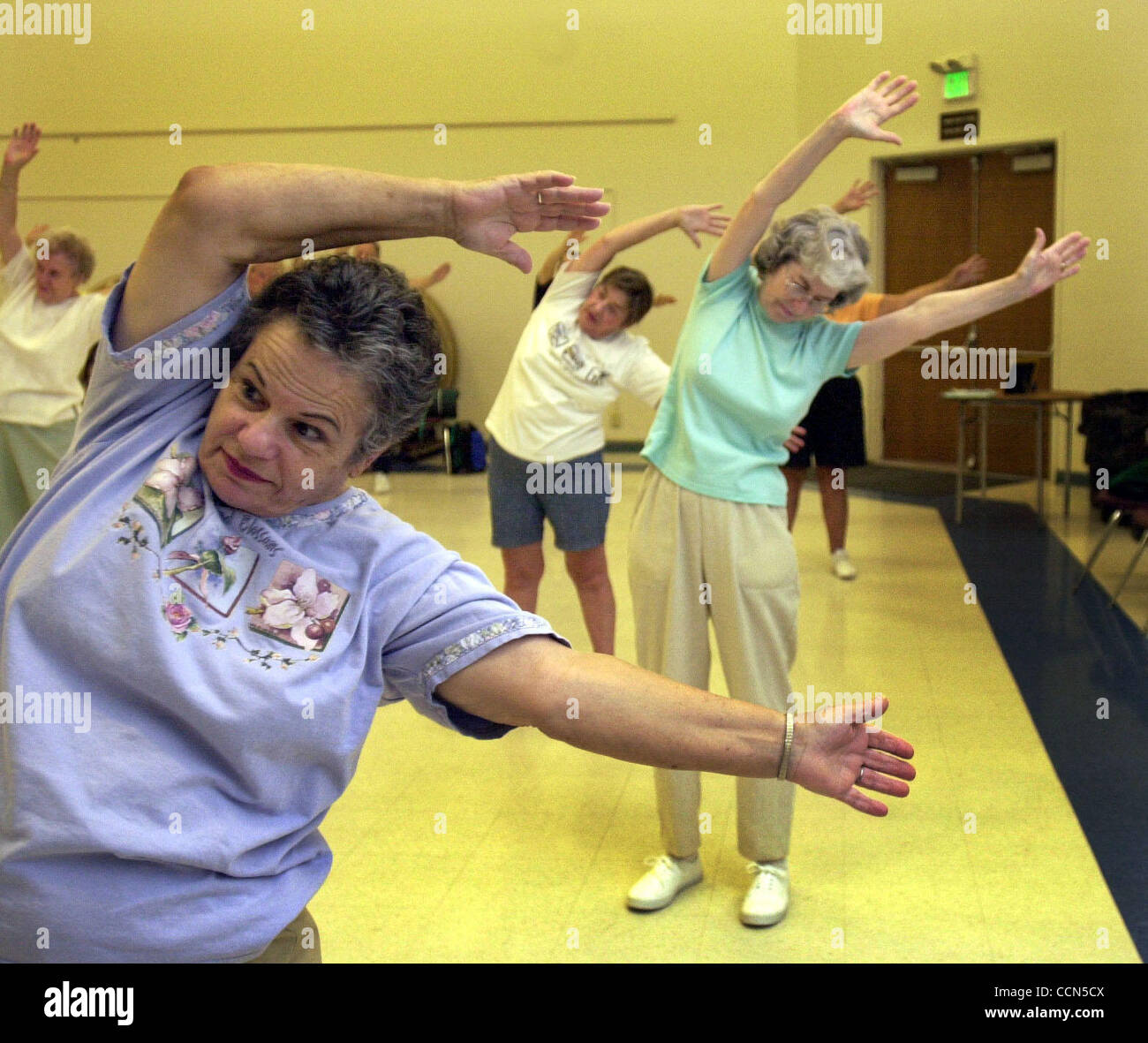 Esther Calabrese, left, Margaret Cooley, Shelly Newton and others work ...