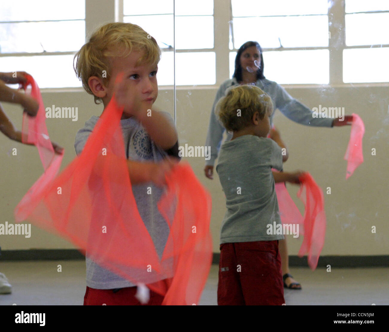 Blaise Place makes designs in the air with a scarf during the Music ...