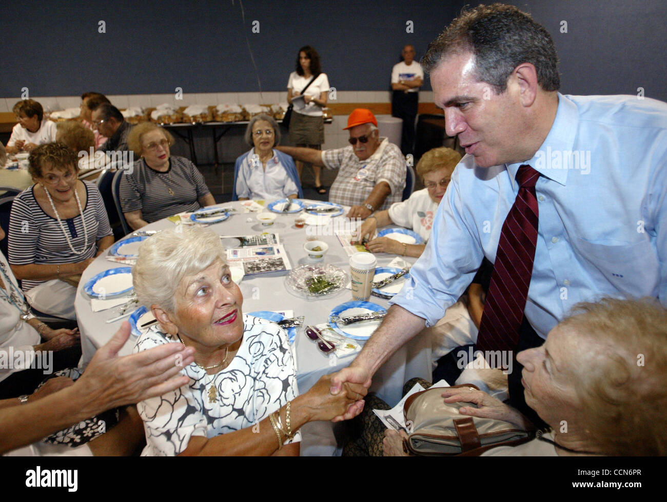 082904 -- US Senate candidate Peter Deutsch (right) appeared at the ...