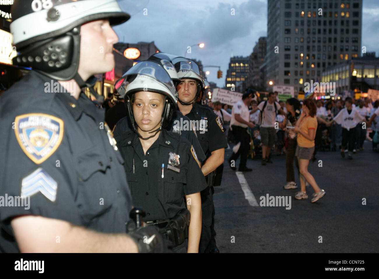 Aug 30, 2004; New York, NY, USA; Police watch the crowd as more ...
