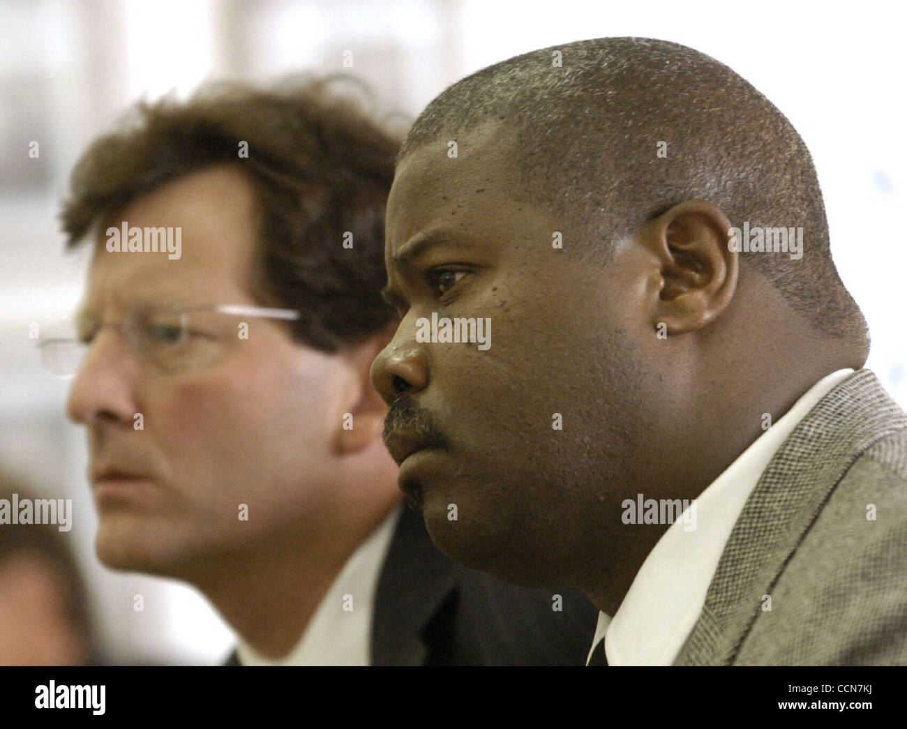 Calvin Whittington Sr., right, the father of Calvin Whittington, and ...