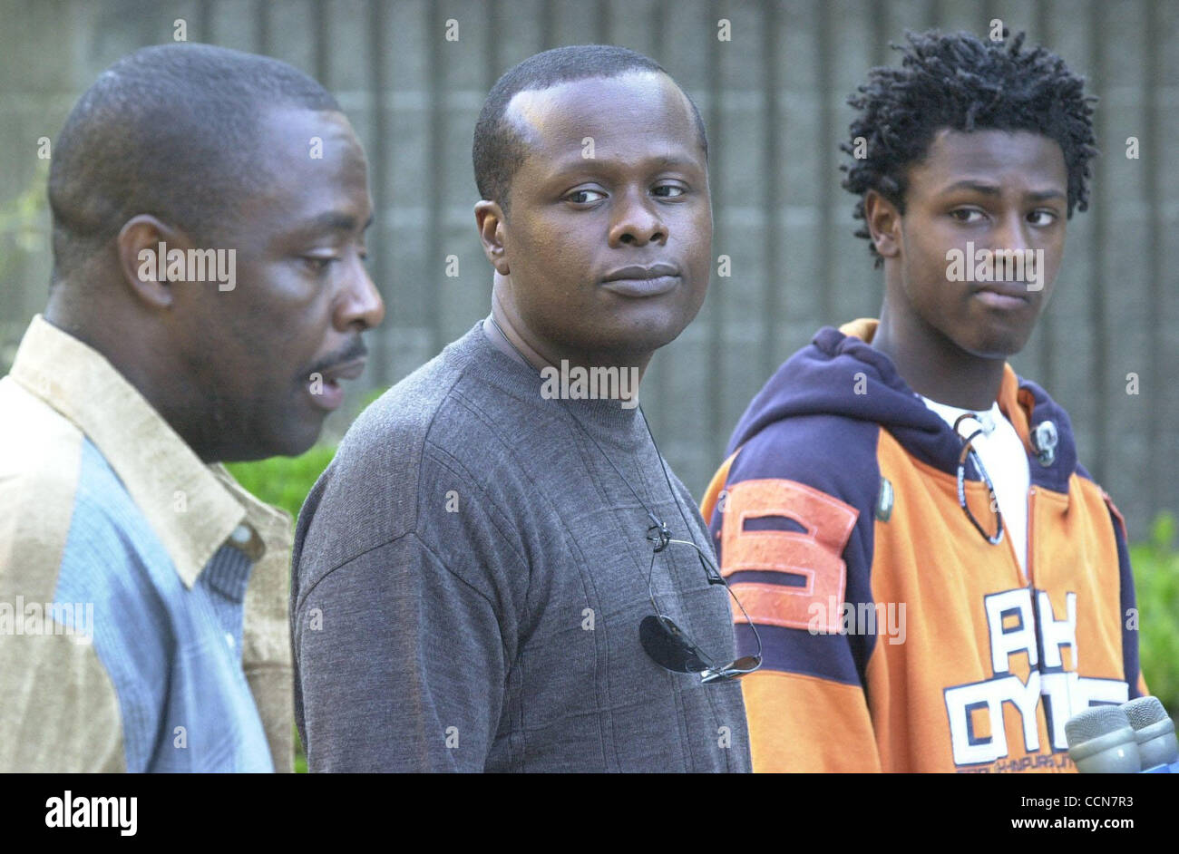 Larry Pratcher, left, answers some media questions as lawyer Githaiga ...