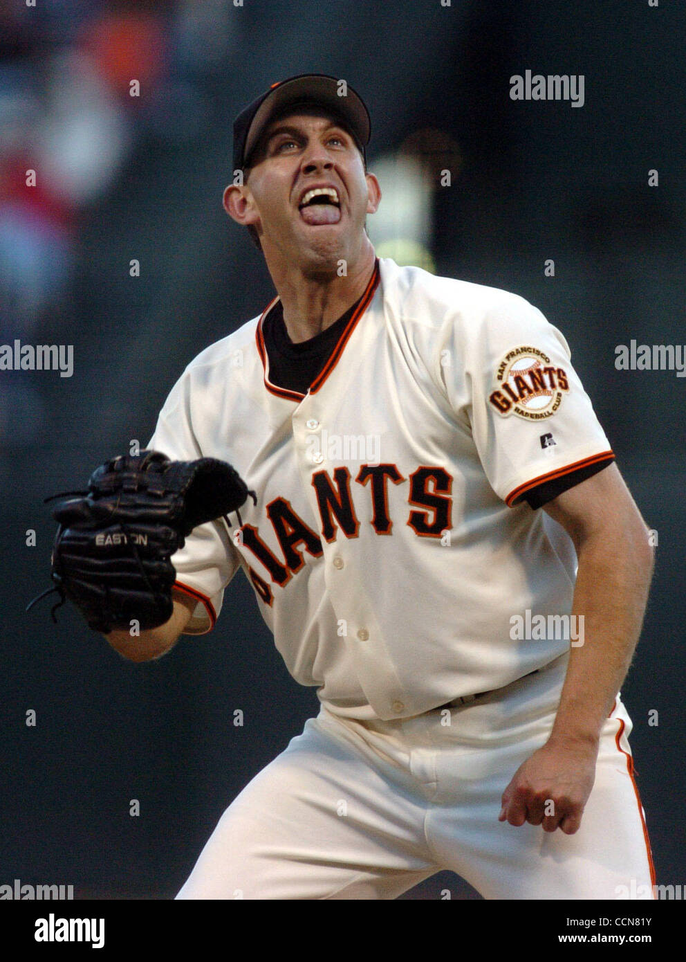 San Francisco Giants pitcher Kirk Rueter, #46, reacts after giving up a ...