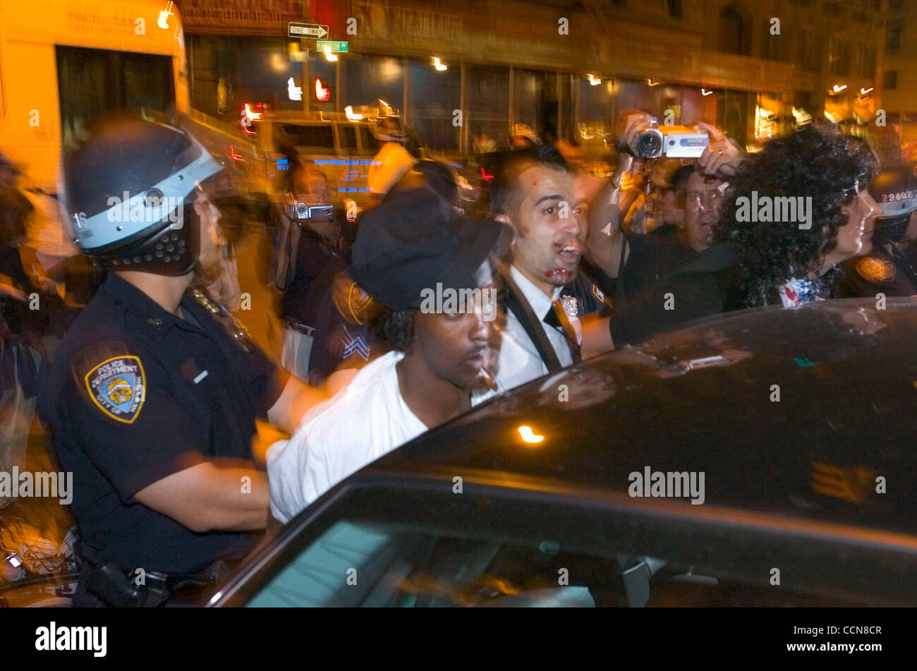 Aug 31, 2004; New York, NY, USA; New York City Police officers arrest ...