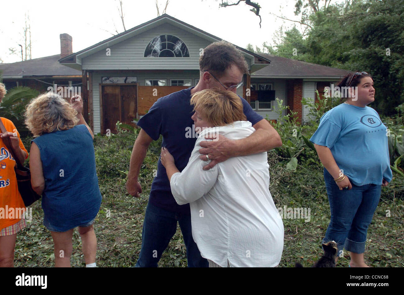 STATE - Braxton Yates II embraces Donna Cabrera in rural Escambia ...