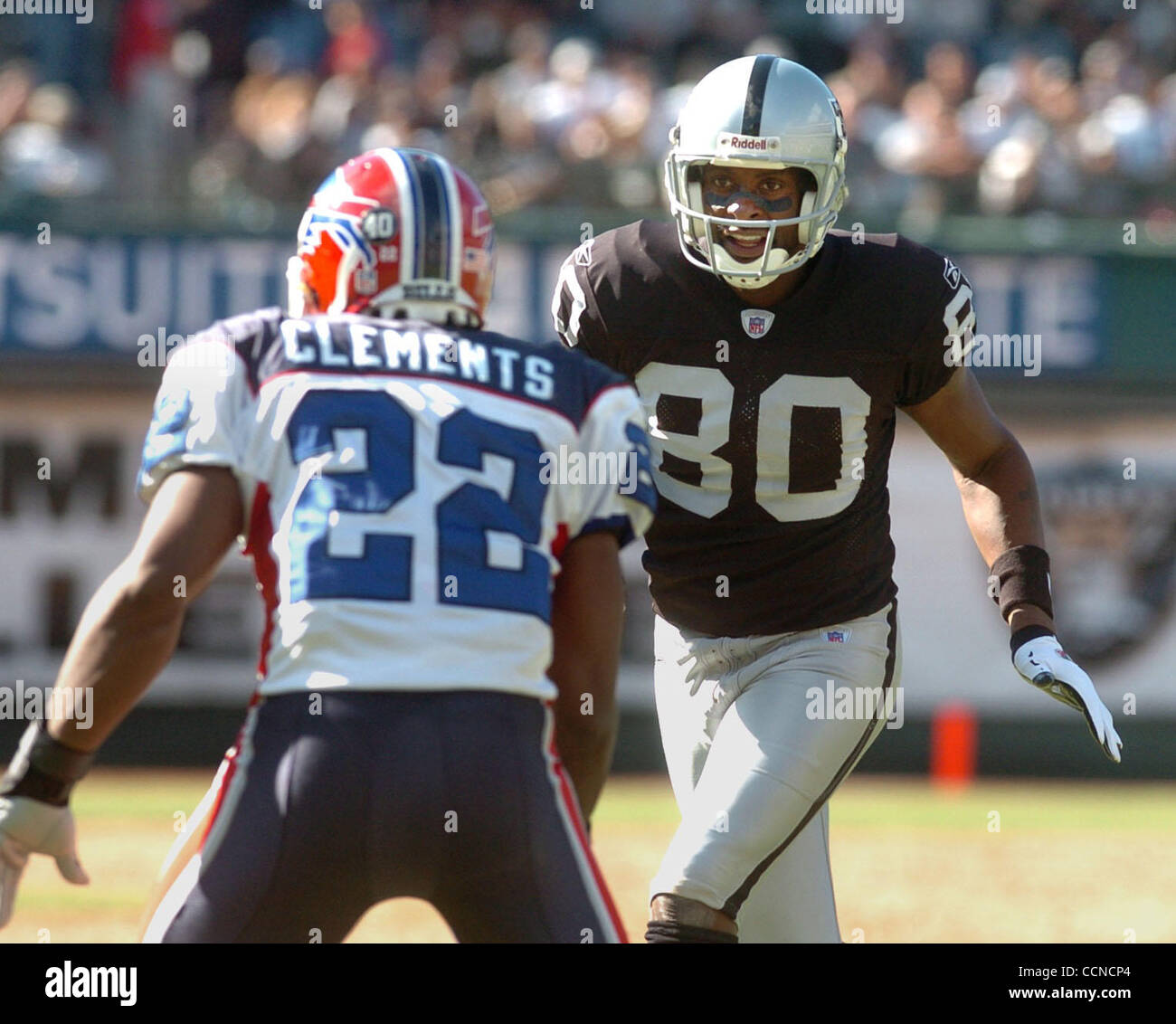 The Oakland Raiders Jerry Rice (cq, right) comes off the line of ...