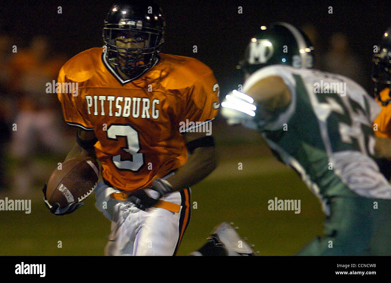 Pittsburg's Derrick Blanche (cq)(left) runs for the second of 3 first ...
