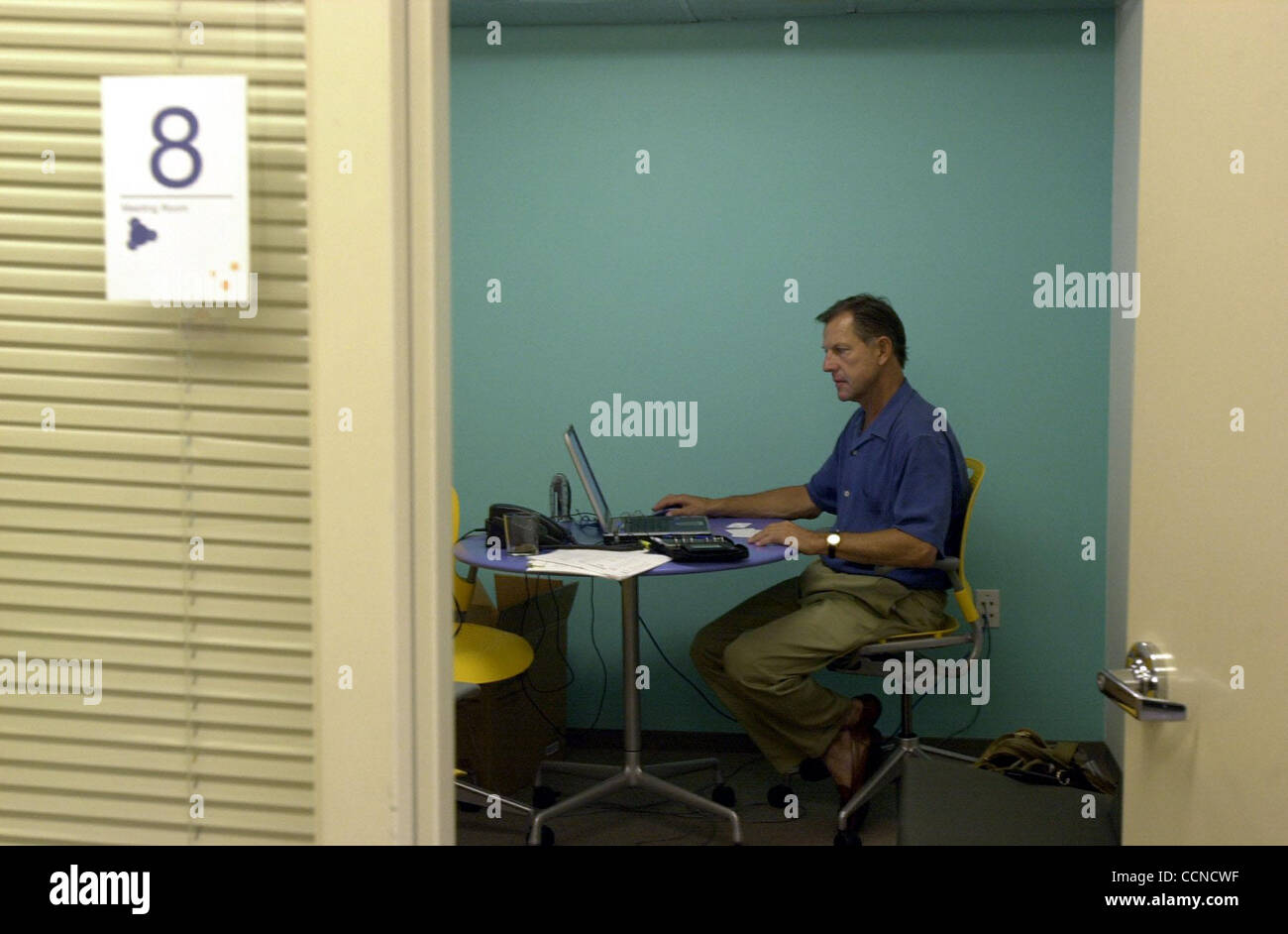 iSeva business client Bruce Molloy, uses a small meeting room to do ...