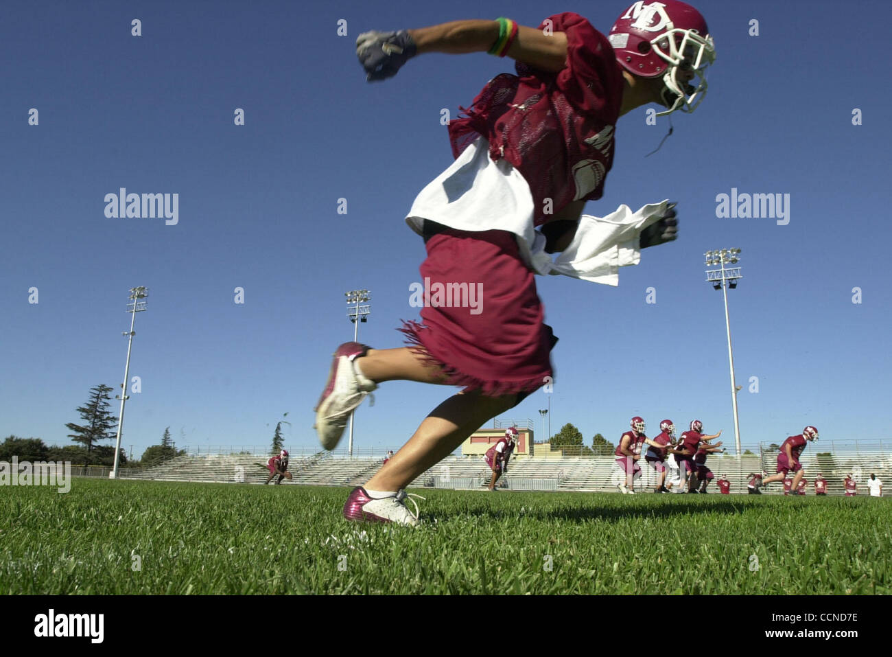 Mount Diablo football player Uberne Mendieta (CQ) sprints downfield ...