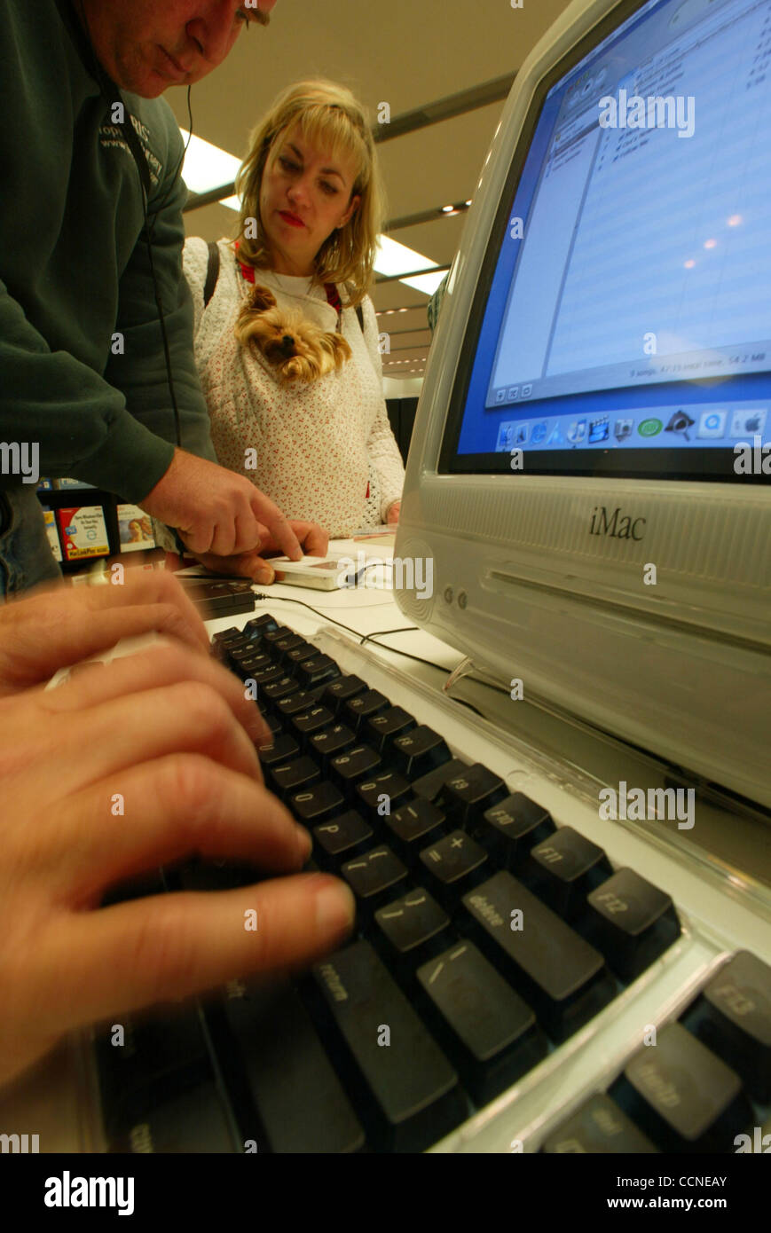 Sep 28, 2004; San Rafeal, CA, USA; Consumers browse Macintosh products ...