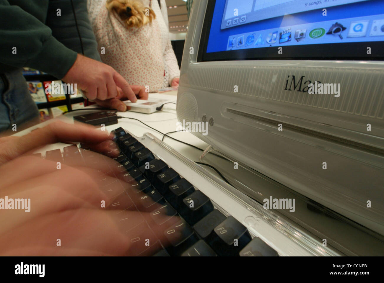 Sep 28, 2004; San Rafeal, CA, USA; Consumers browse Macintosh products ...