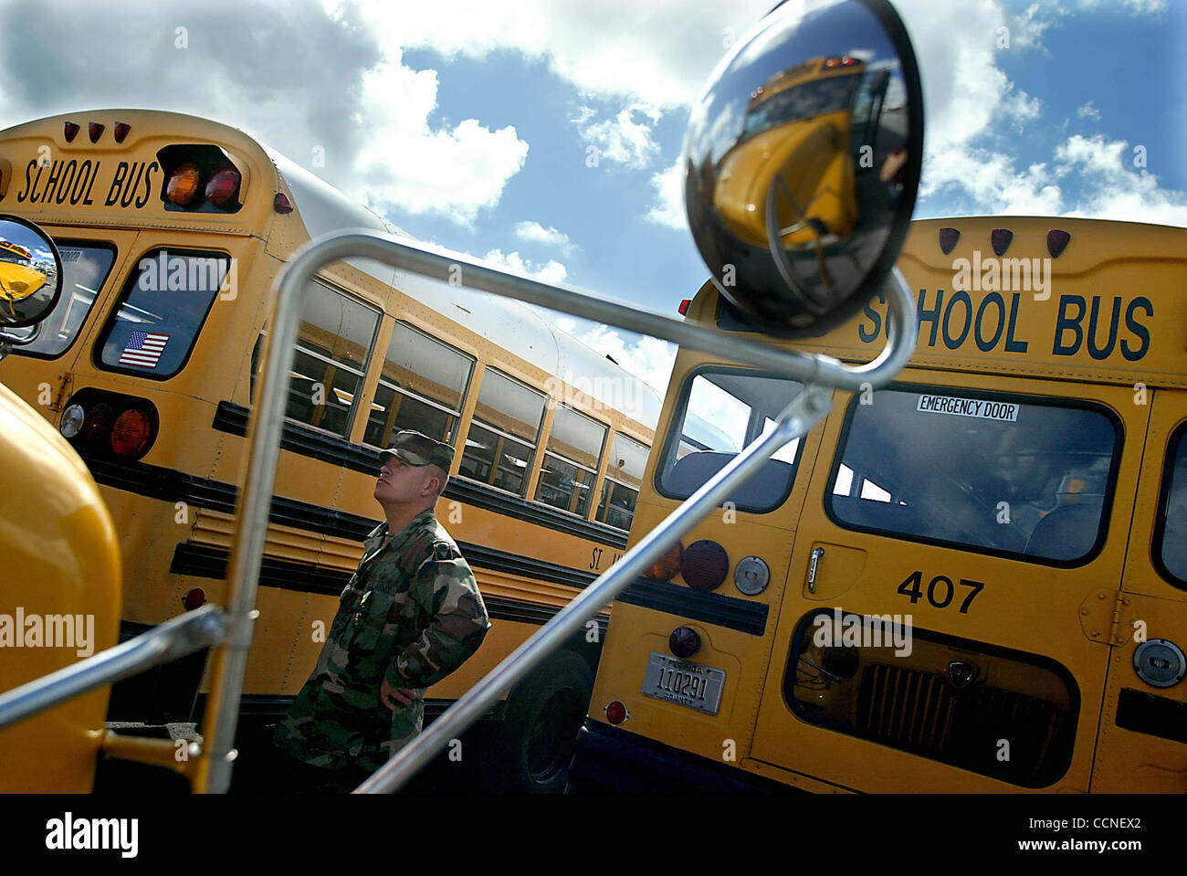 100304-Fort Pierce-National Guardsman Spec. William Booher, cq, pauses ...