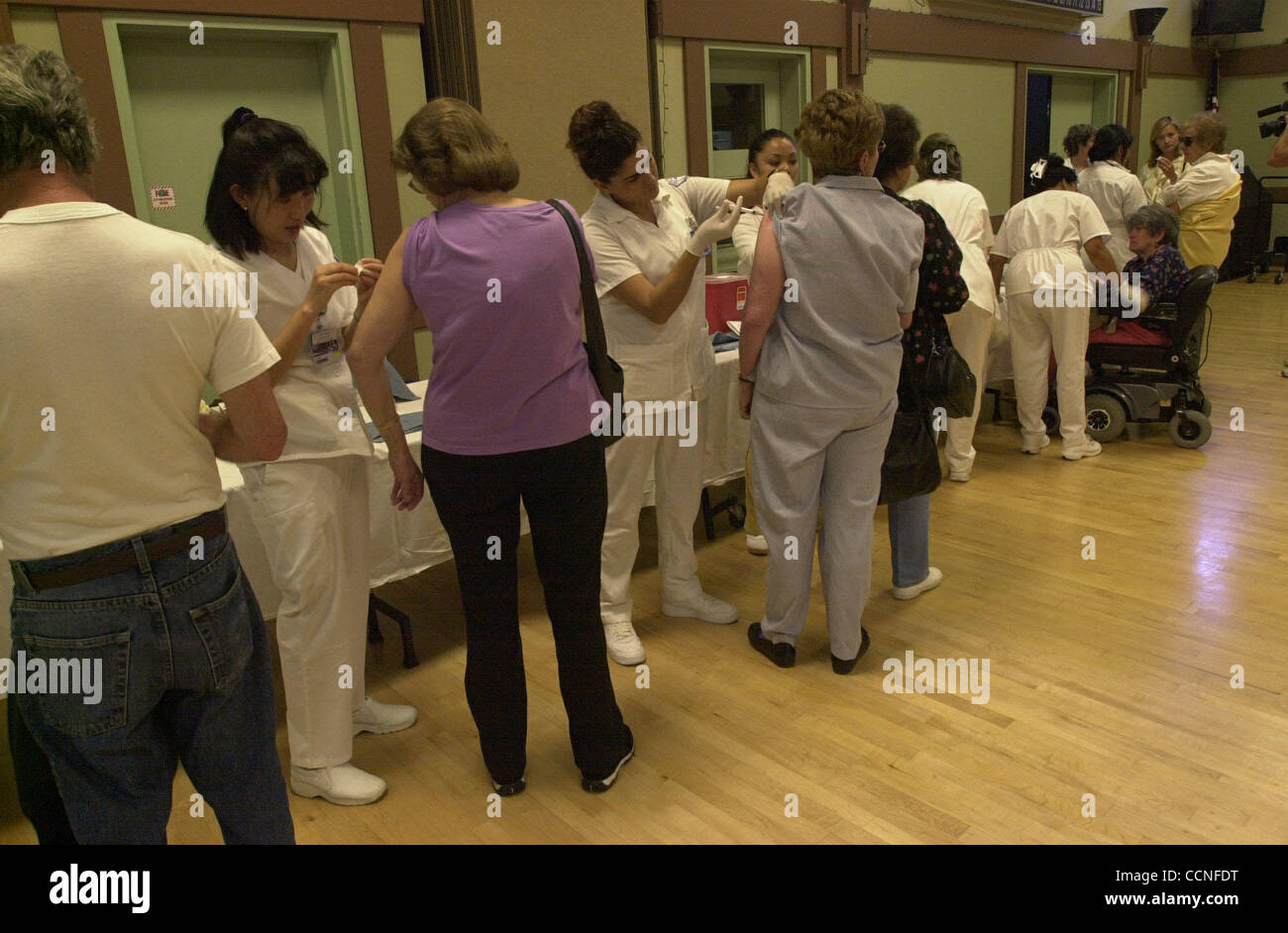Contra Costa College student nurses give influenza virus vaccine shots ...