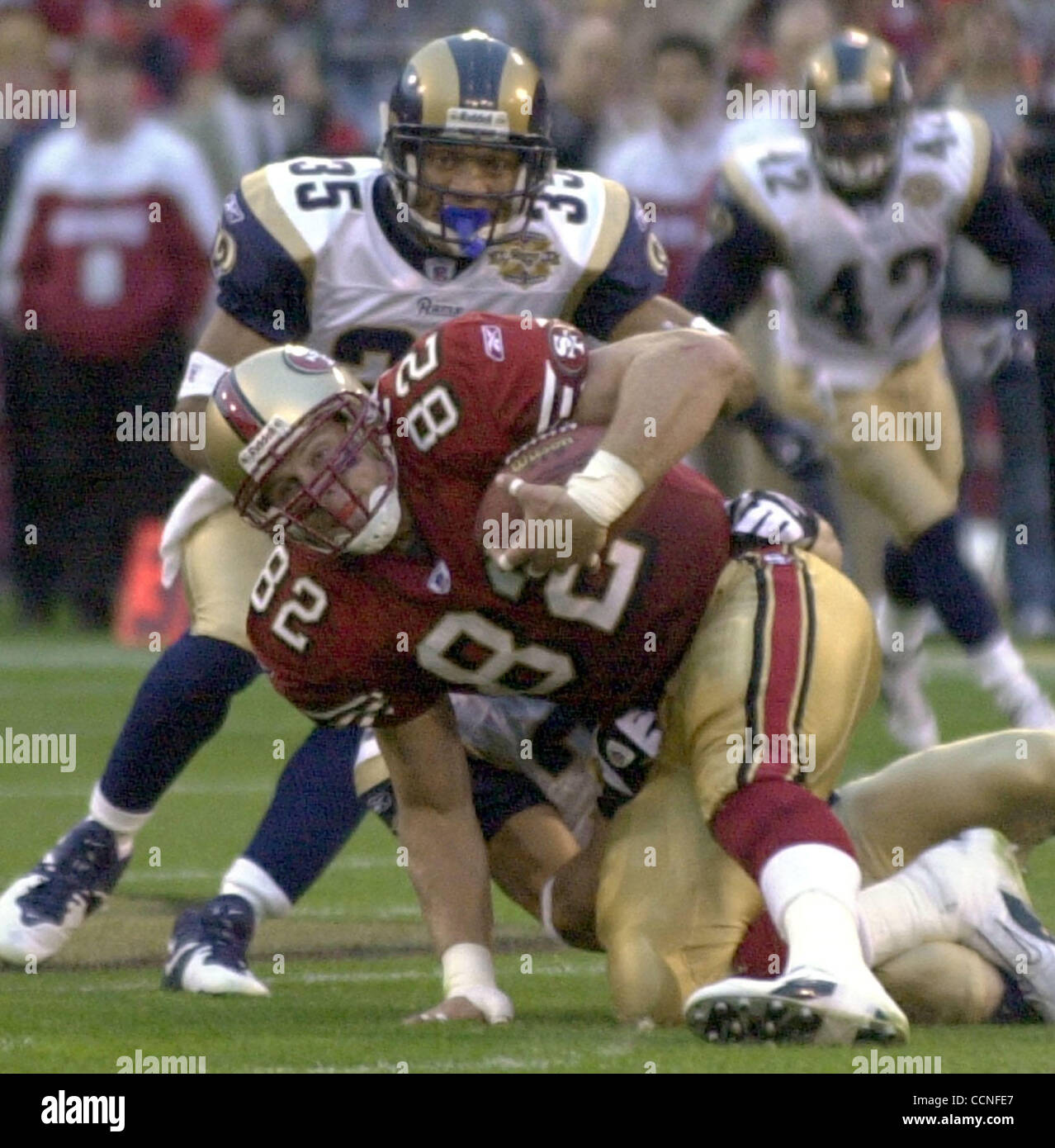 San Francisco 49ers tight end Eric Johnson gets a first down after a ...